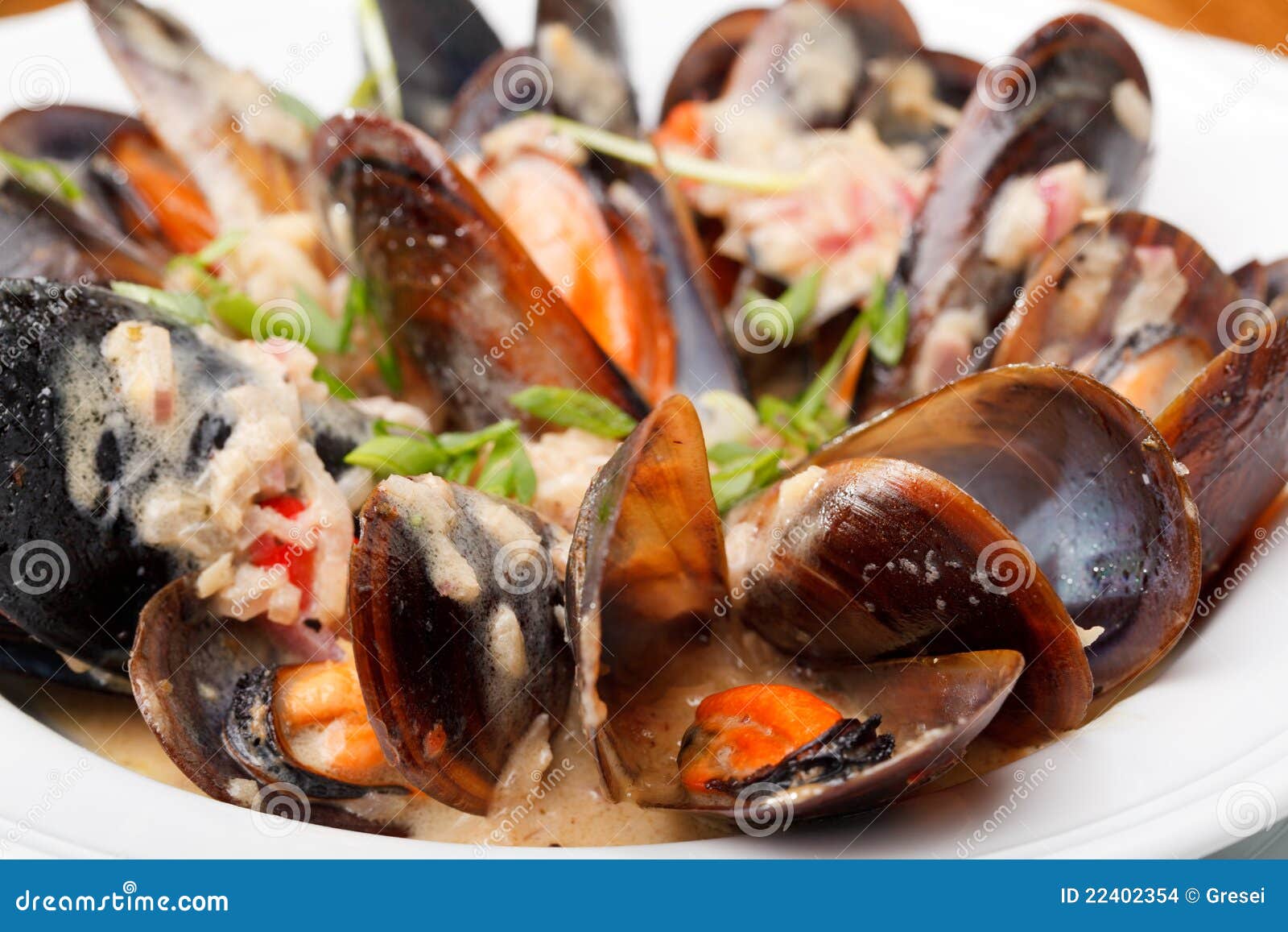 Bowl with cooked mussels stock photo. Image of seafood - 22402354