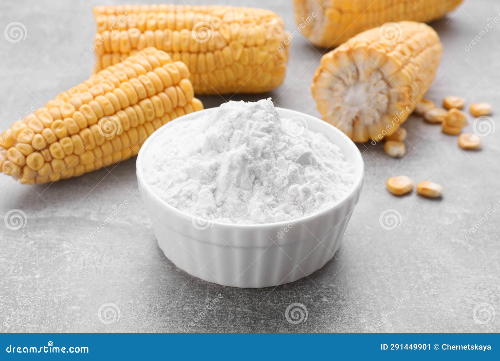 Bowl with Corn Starch and Ripe Cobs on Light Grey Table, Closeup Stock ...