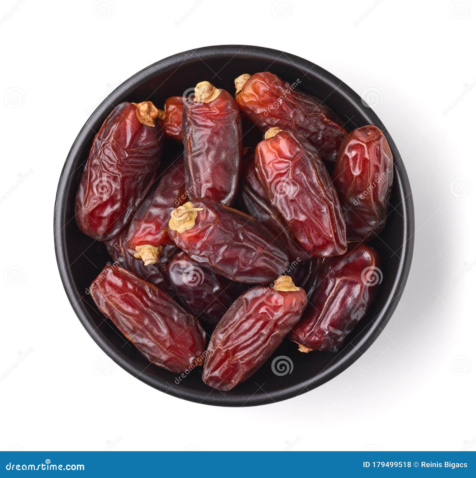 Bowl of Dates Isolated on White, from Above Stock Photo - Image of ...
