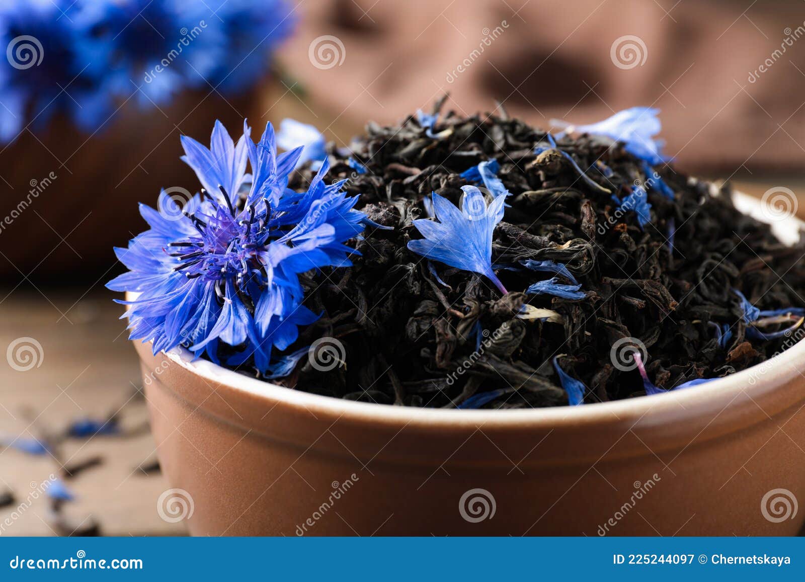 Bowl with Dry Tea Leaves and Cornflower, Closeup Stock Image - Image of ...