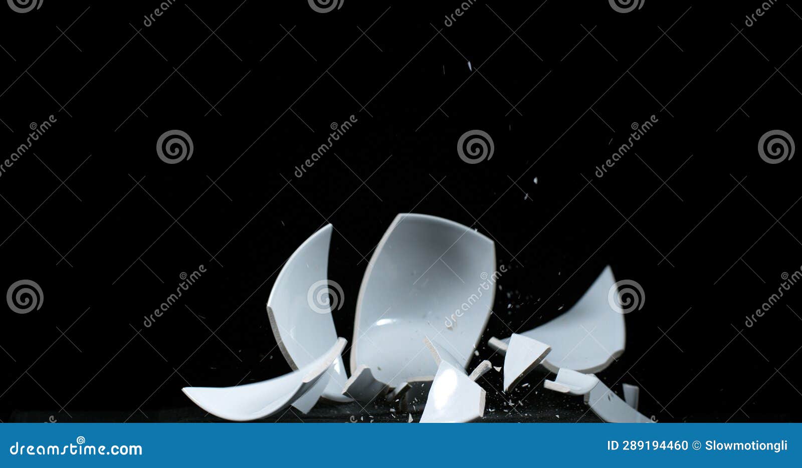 Bowl Falling and Exploding on Black Background Stock Photo - Image of ...