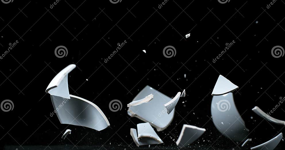 Bowl Falling and Exploding on Black Background Stock Photo - Image of ...