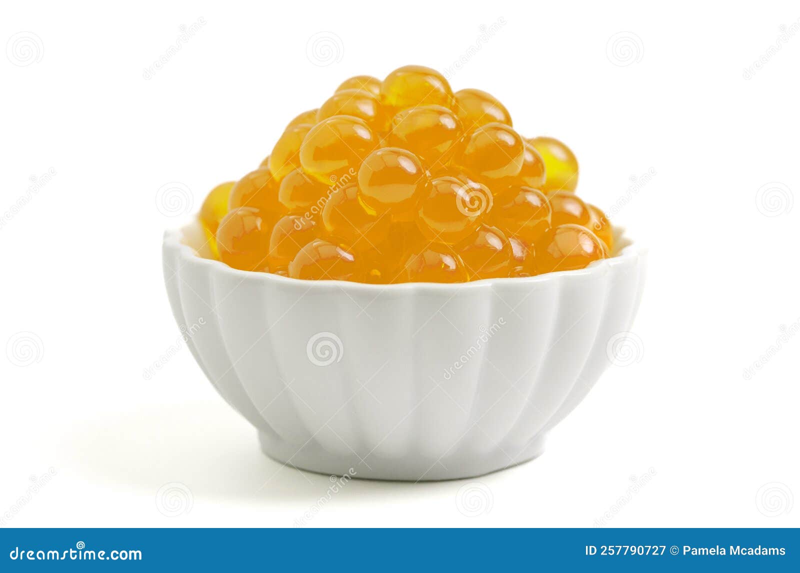 A Bowl Filled with Popping Boba on a White Background Stock Image ...