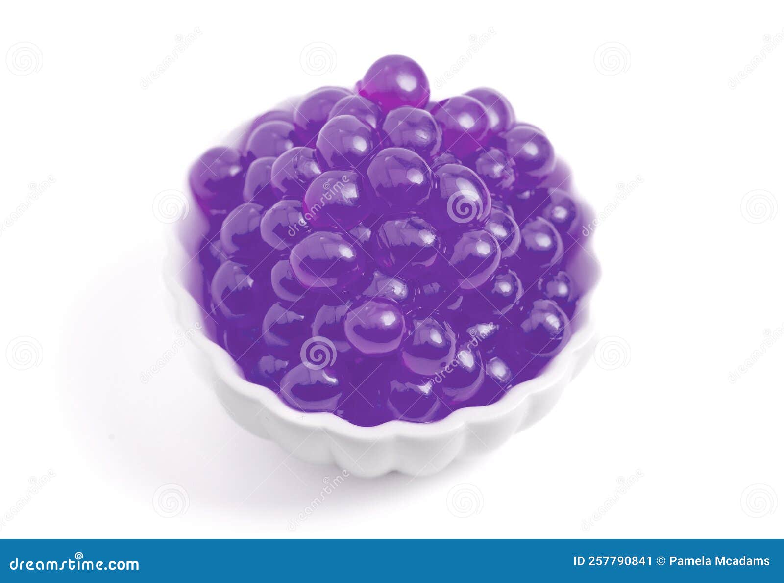 A Bowl Filled with Popping Boba on a White Background Stock Image ...