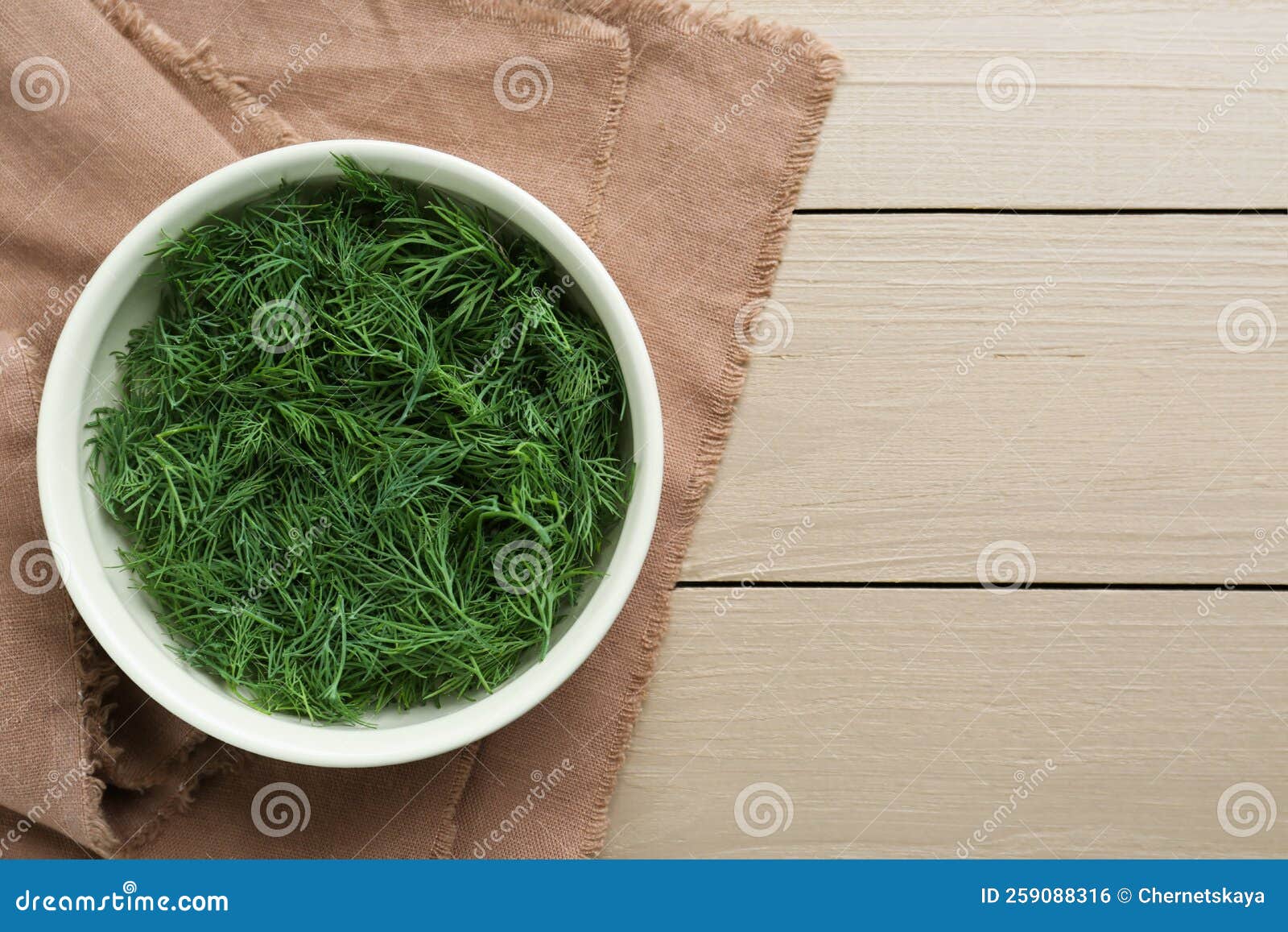 Bowl of Fresh Dill on Wooden Table, Top View. Space for Text Stock ...