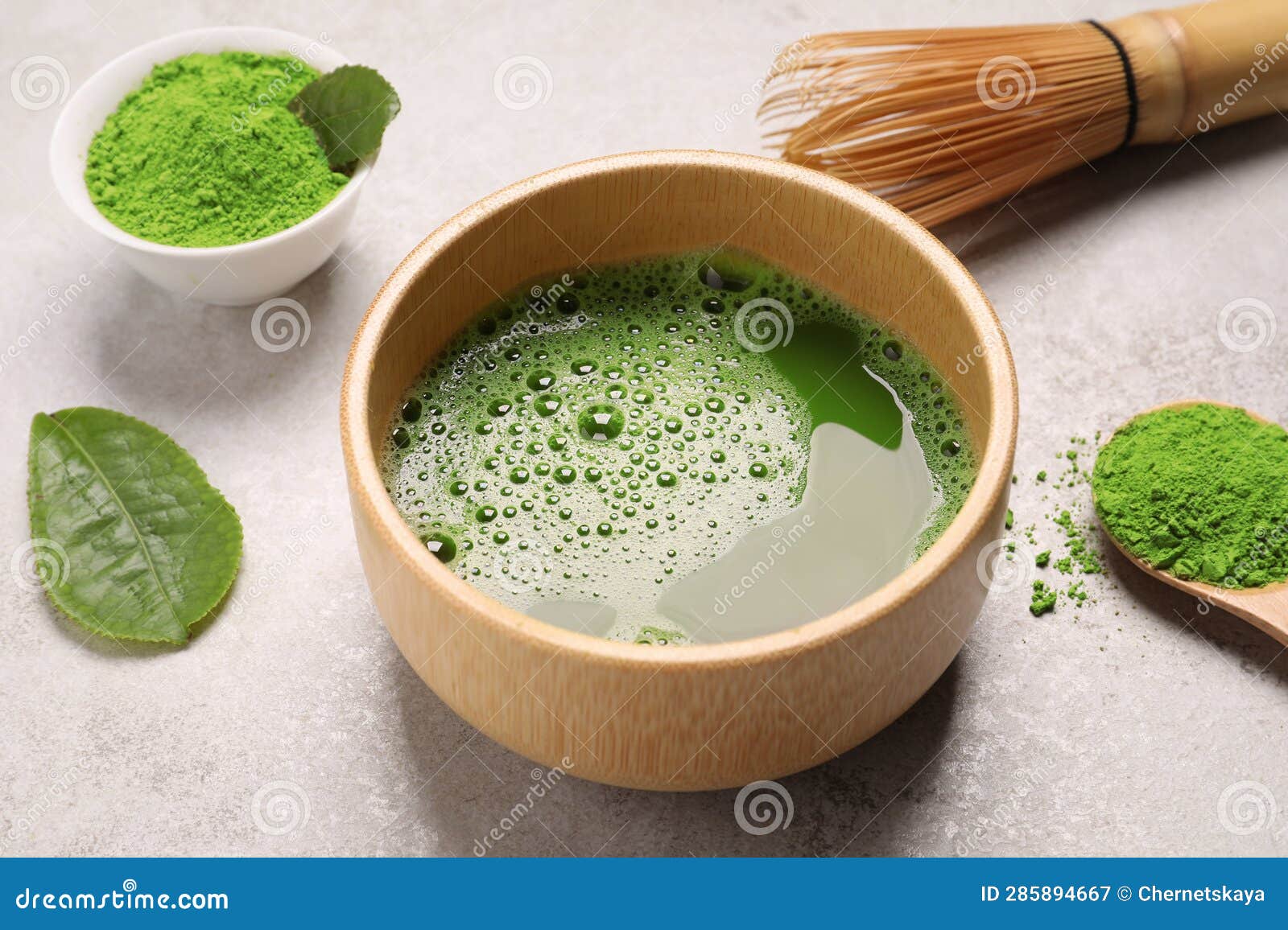 Bowl of Fresh Matcha Tea, Bamboo Whisk and Powder on Light Table Stock ...