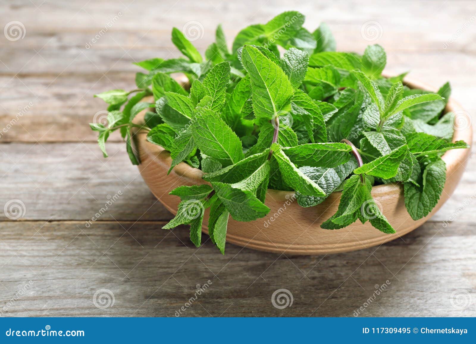 Bowl with Fresh Mint on Table Stock Image - Image of aromatic, green ...