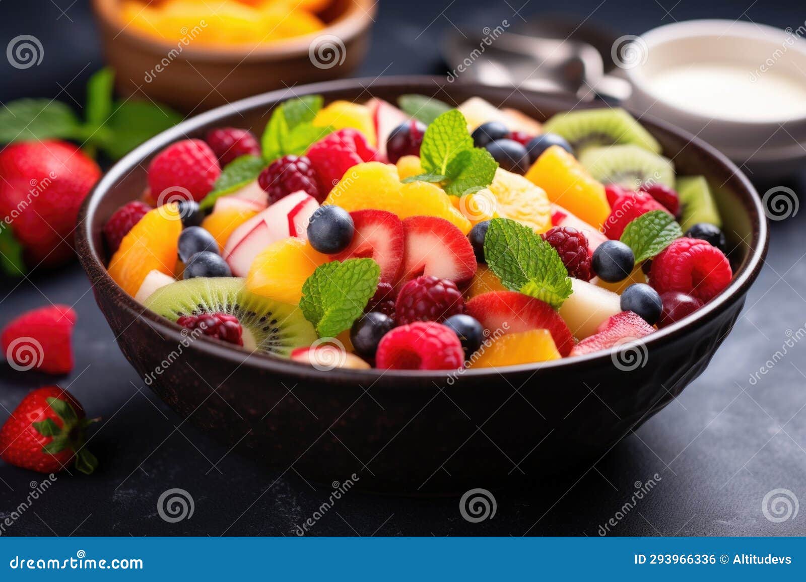 Bowl of Fresh Mixed Fruit Salad with Mint Leaves on Top Stock ...