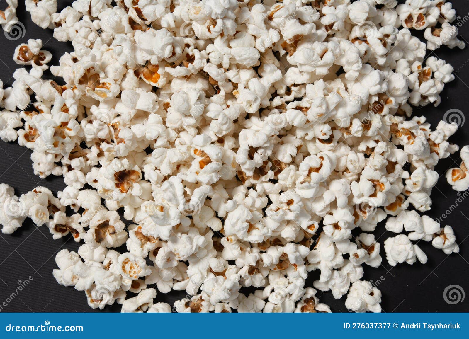 A Bowl of Freshly Cooked Popcorn on a Black Background, Popcorn Texture ...