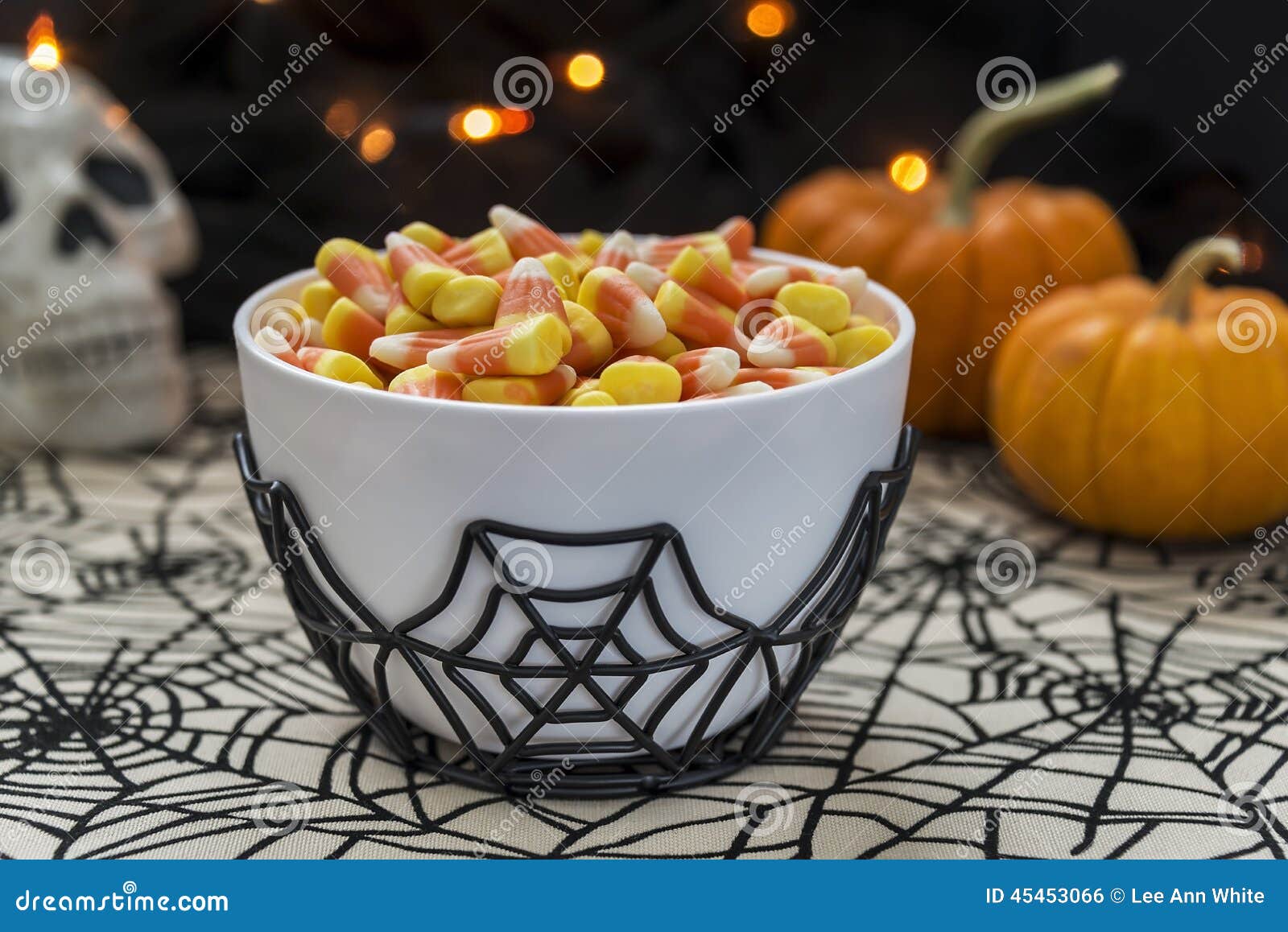 A Bowl Full of Halloween Candy Corn in a Spooky Setting Stock Photo ...