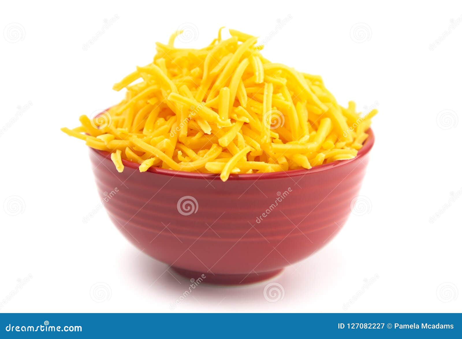 Bowl of Grated Cheddar Cheese on a White Background Stock Image - Image ...
