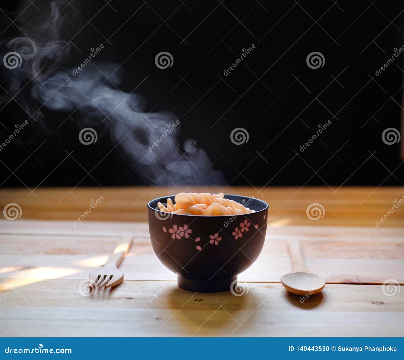 A Bowl of Hot Food with Smoke on Dark Background. Stock Photo - Image ...