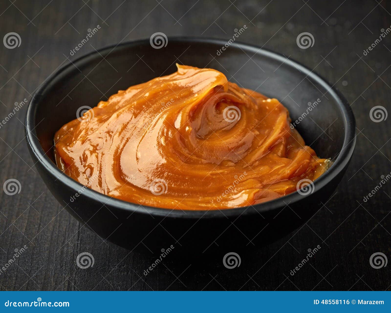 Bowl of Melted Caramel Cream Stock Photo - Image of cooking, milk: 48558116