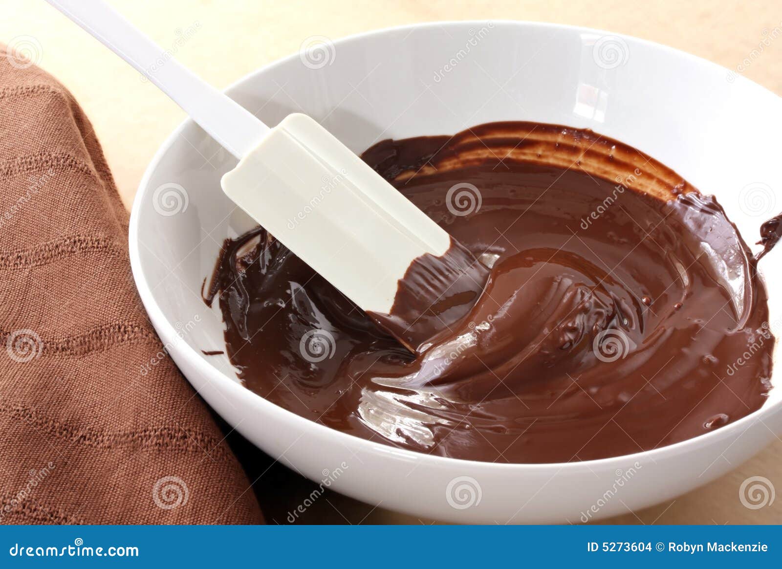 Bowl of Melted Chocolate stock photo. Image of napkin - 5273604