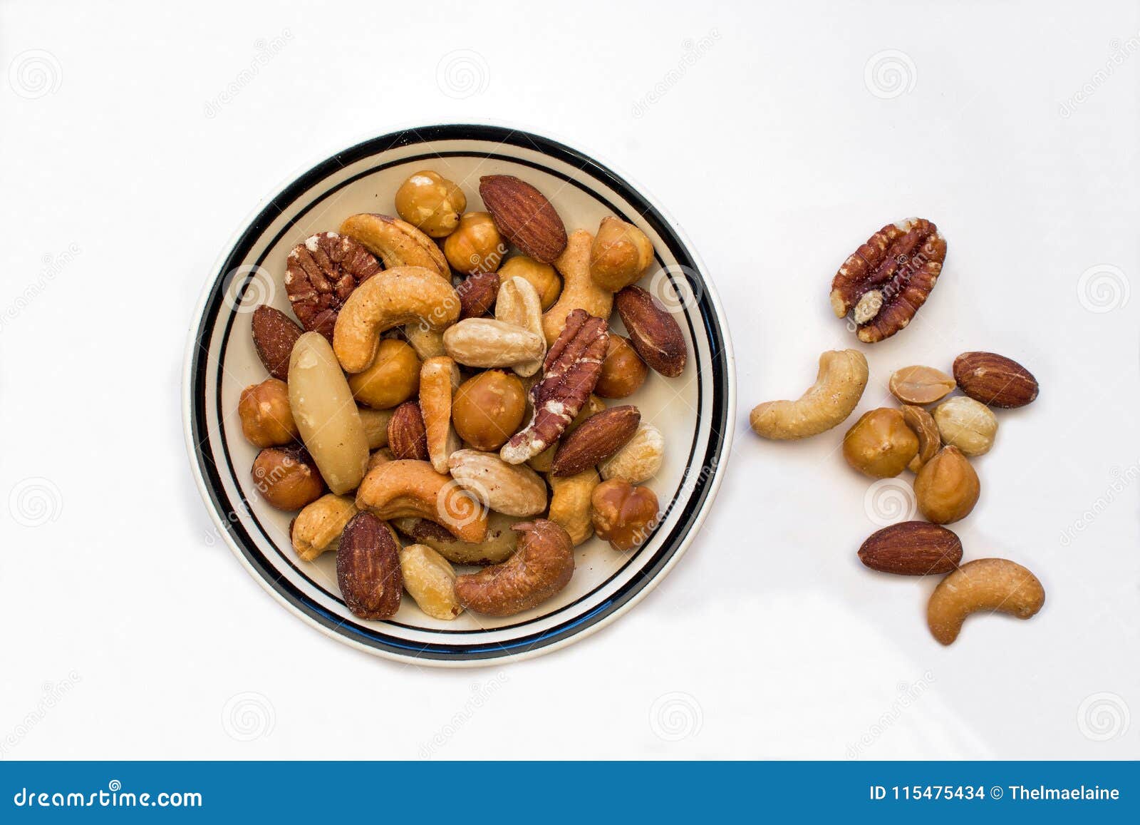 Bowl of Mixed Nuts on a White Background Stock Photo - Image of pecan ...