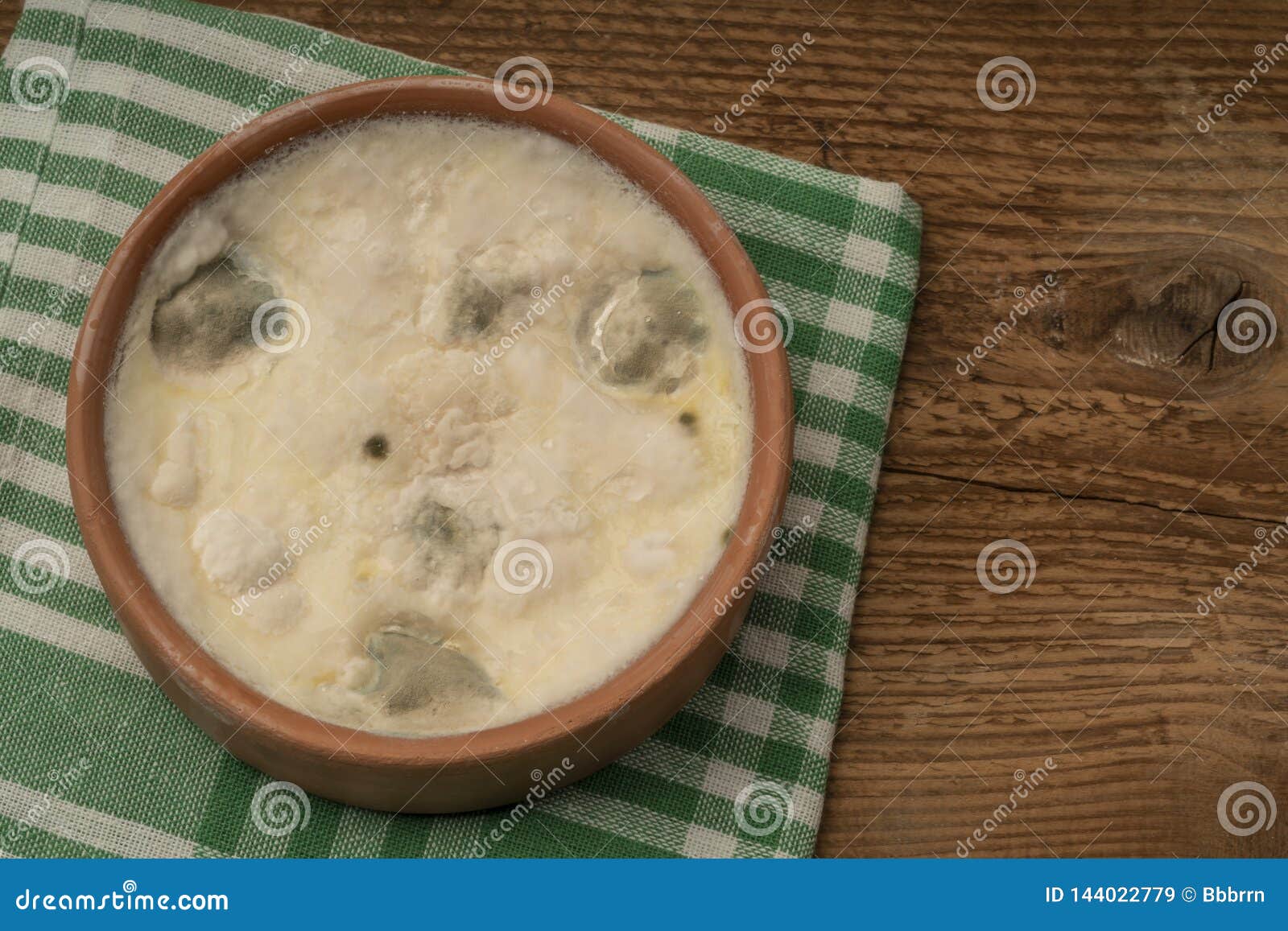 A Bowl of Moldy Yogurt on Wooden Table Stock Image - Image of mold ...