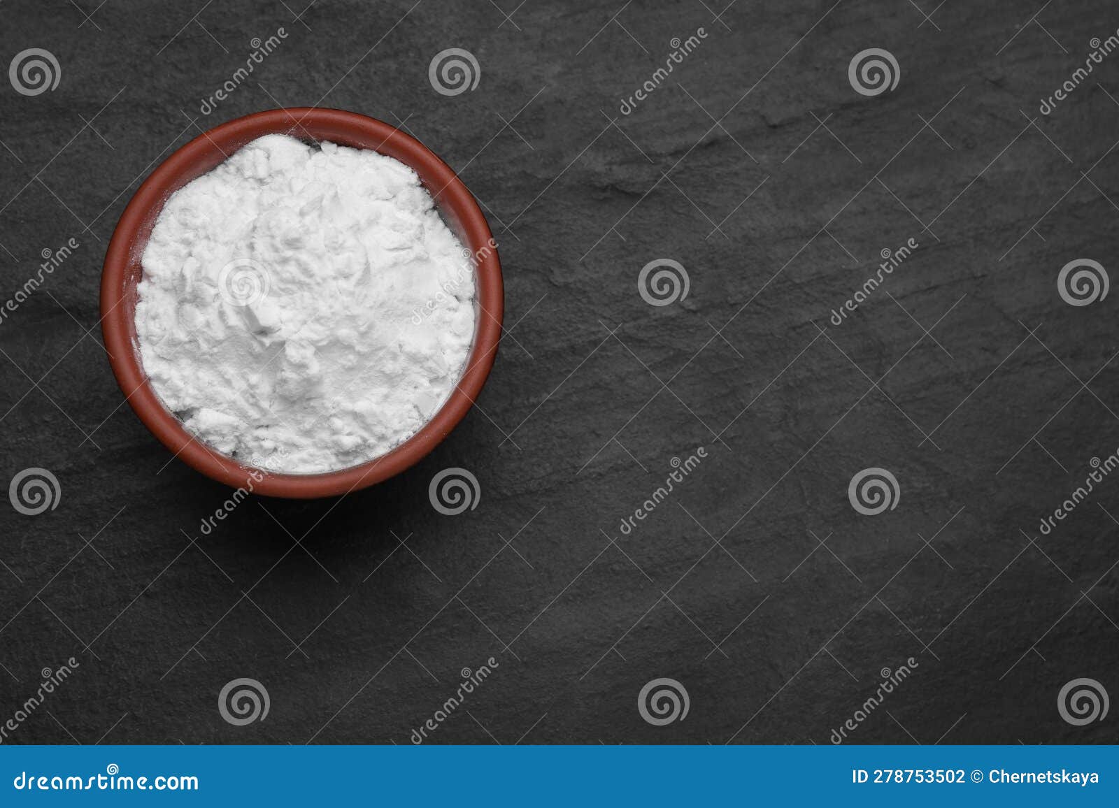 Bowl of Natural Starch on Black Table, Top View. Space for Text Stock ...