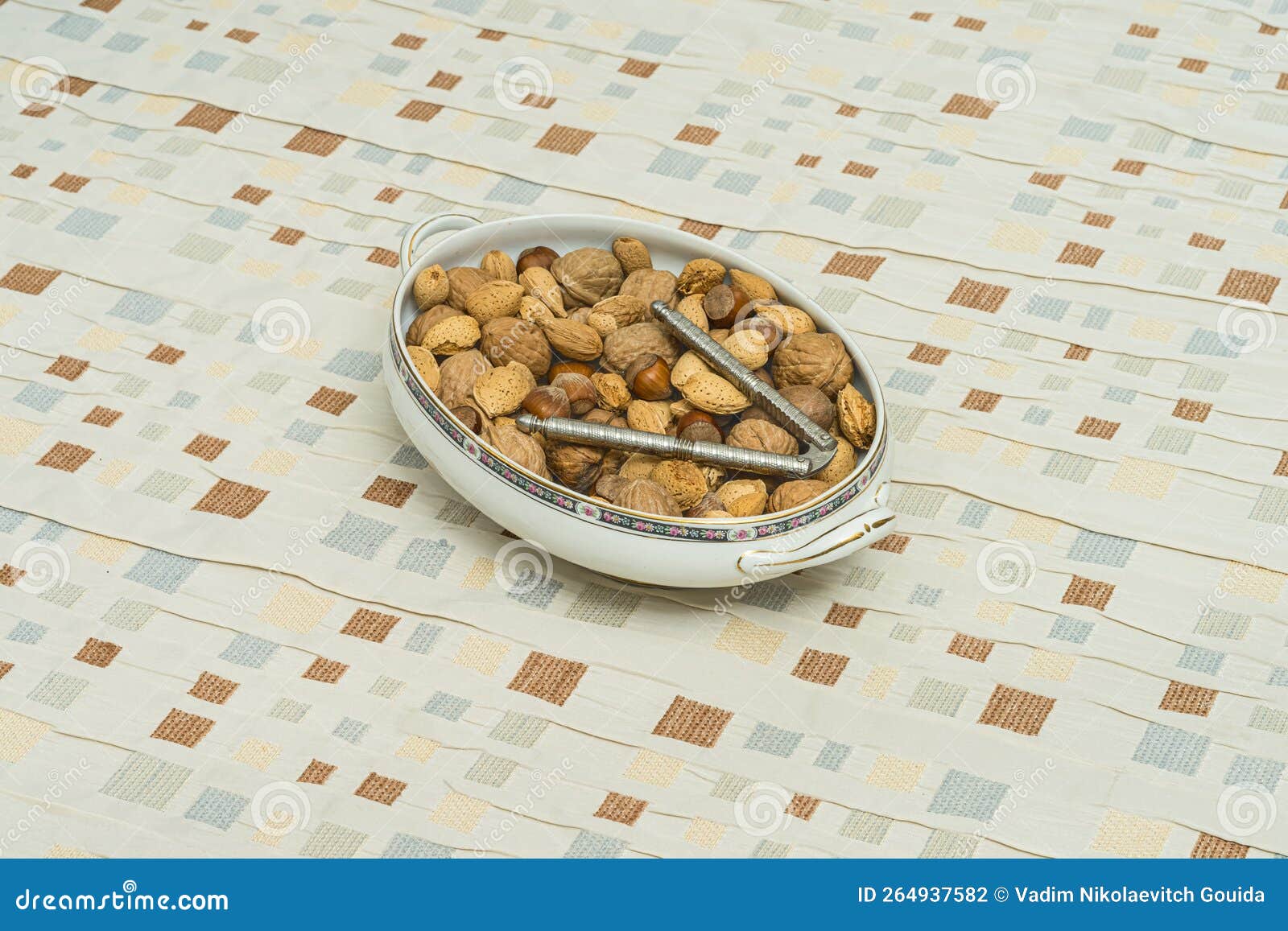 Bowl of Nuts with Nutcracker Stock Photo - Image of cracker, delicious ...