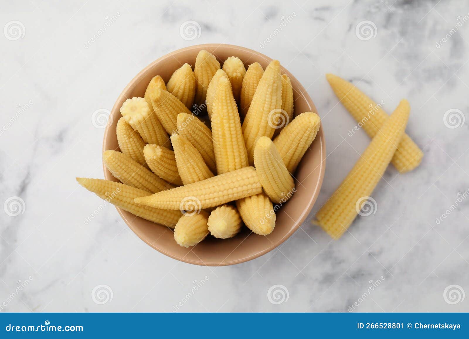 Bowl and Pickled Baby Corn on White Marble Table, Flat Lay Stock Image ...