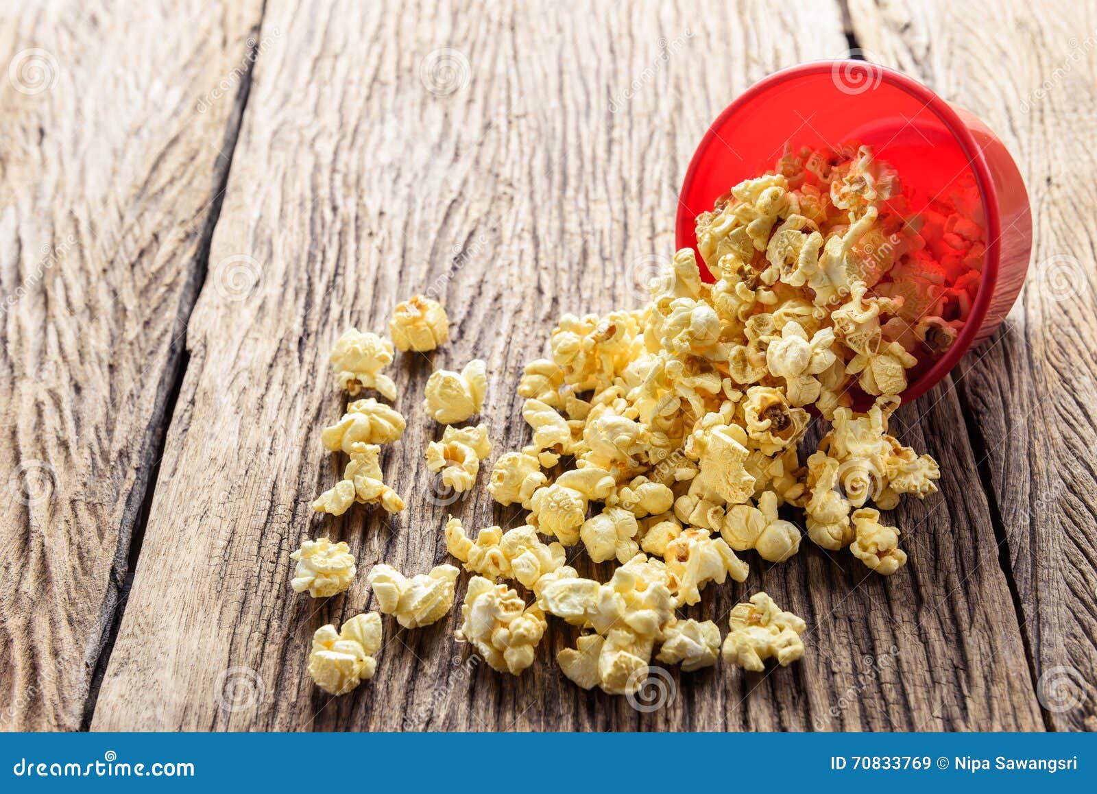Bowl of Popcorn Spilled on Wooden Table Stock Image - Image of fresh ...