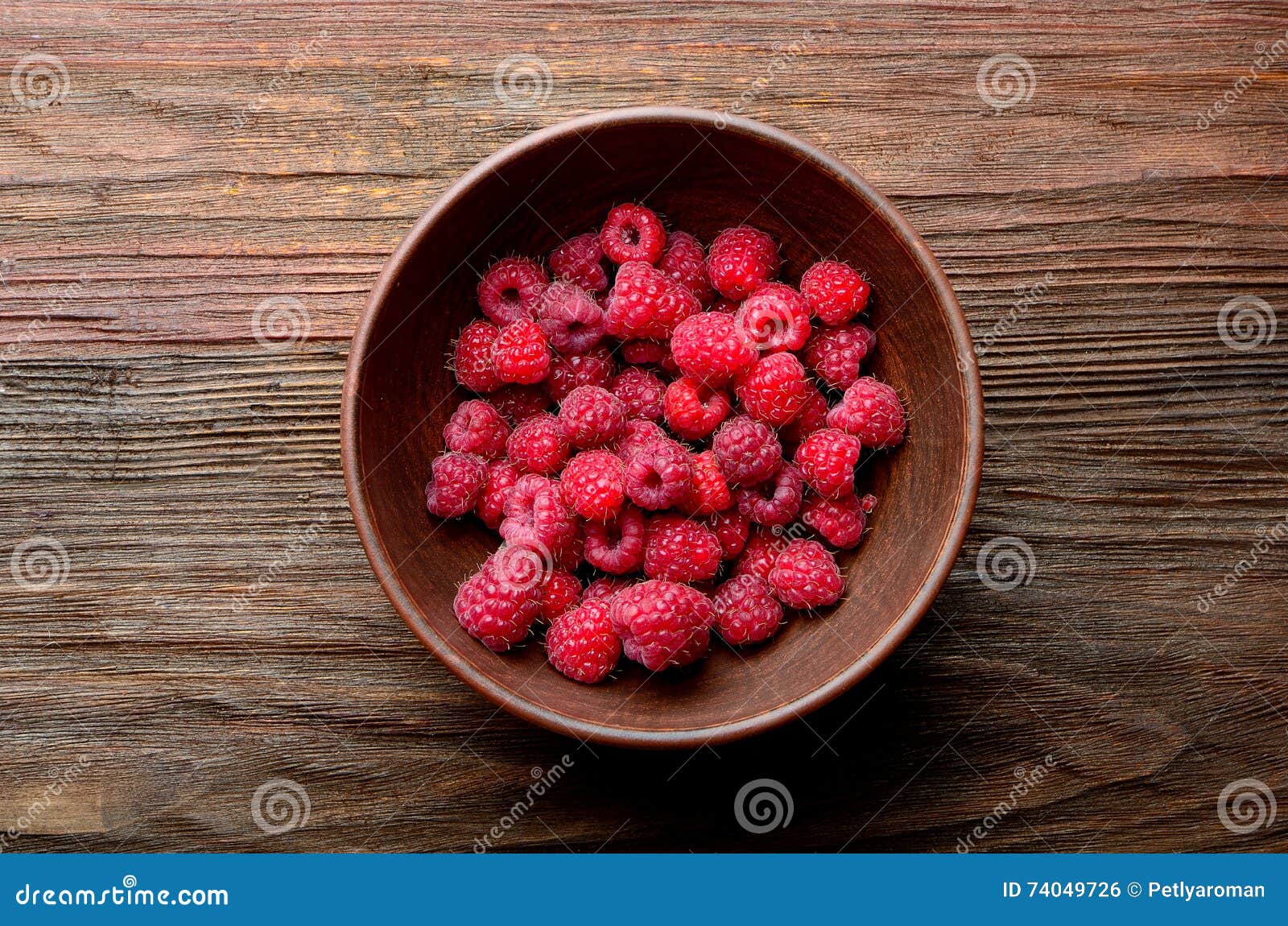 Bowl of raspberries stock photo. Image of healthy, copyspace - 74049726