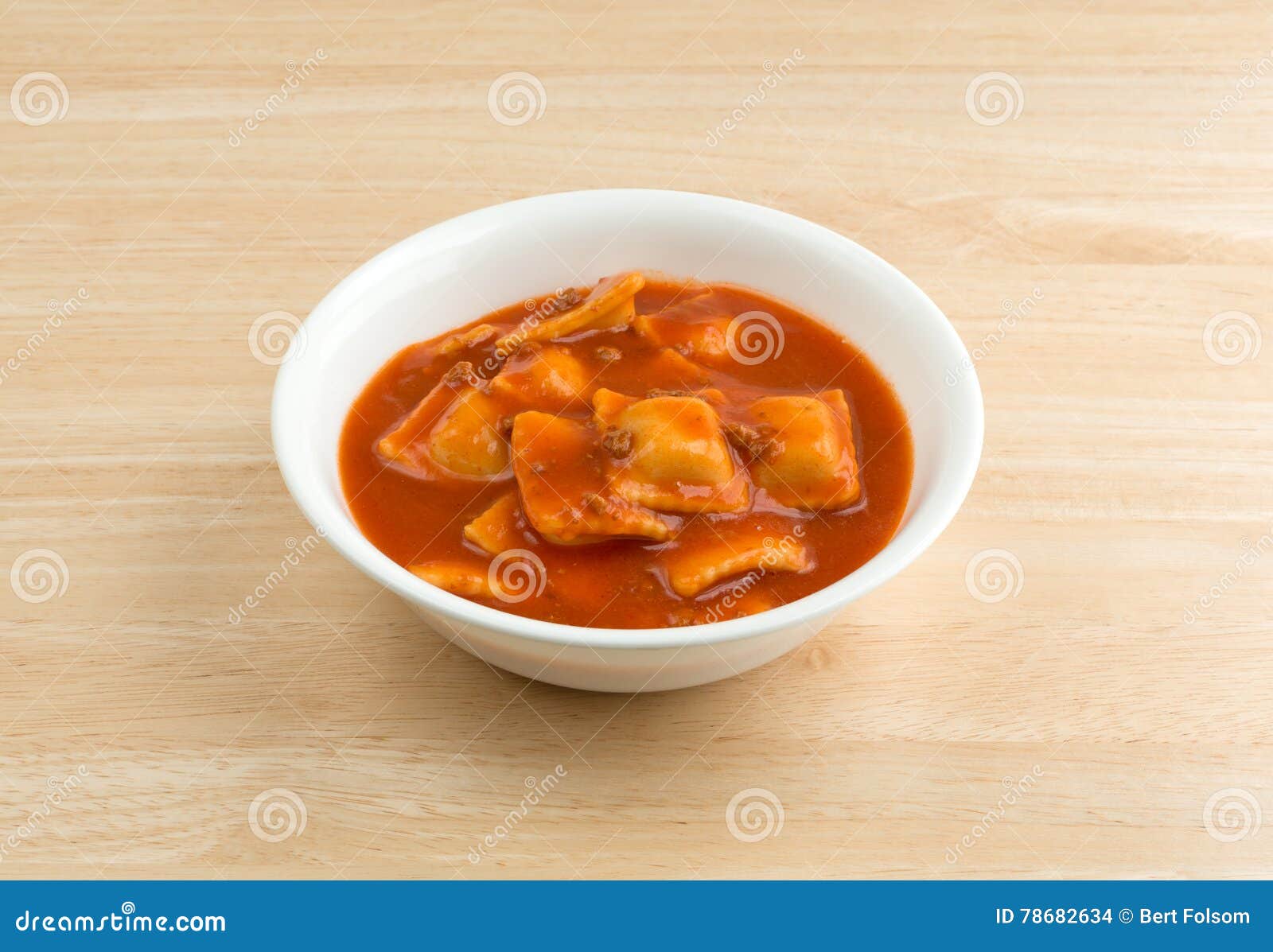 Bowl of Ravioli on a Wood Table Side View. Stock Photo - Image of ...
