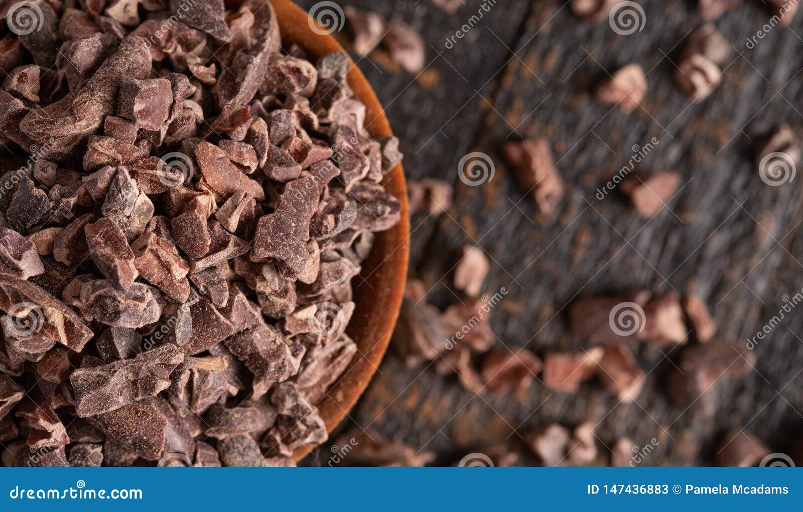 Bowl of Raw Chocolate Nibs on a Rustic Wooden Table Stock Image - Image ...