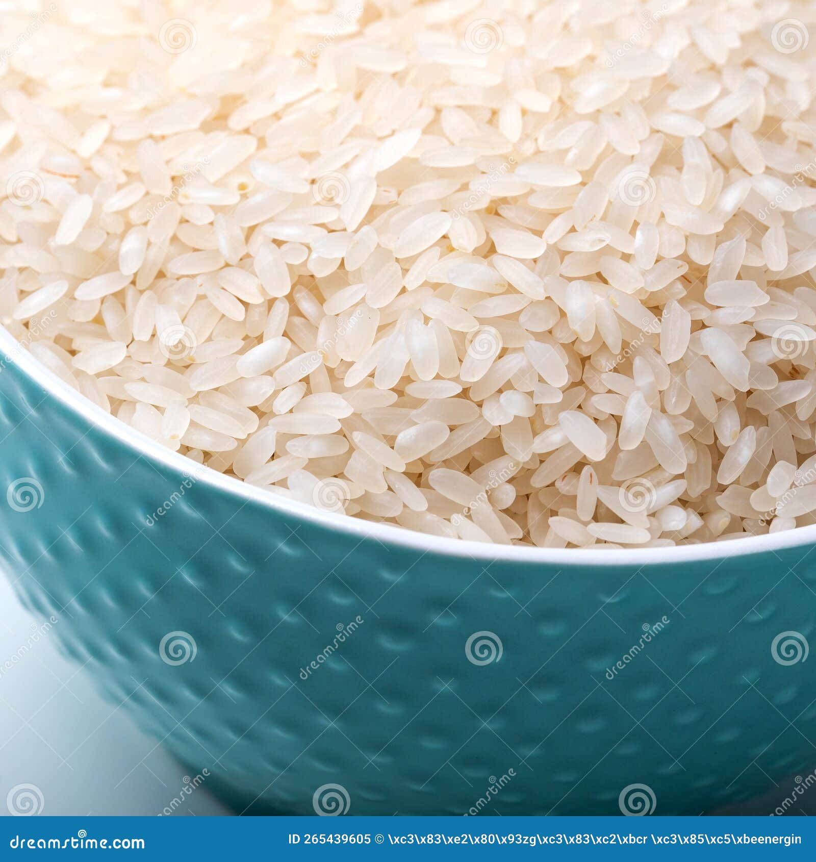 Bowl of Raw Organic Rice on White Background. Blue Bowl Full of Rice on ...