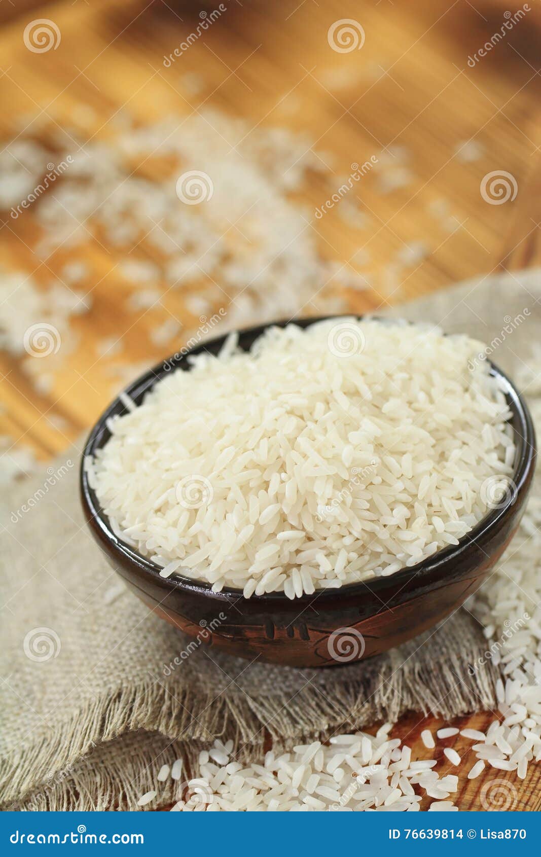 Bowl of raw rice grains stock photo. Image of grain, color - 76639814