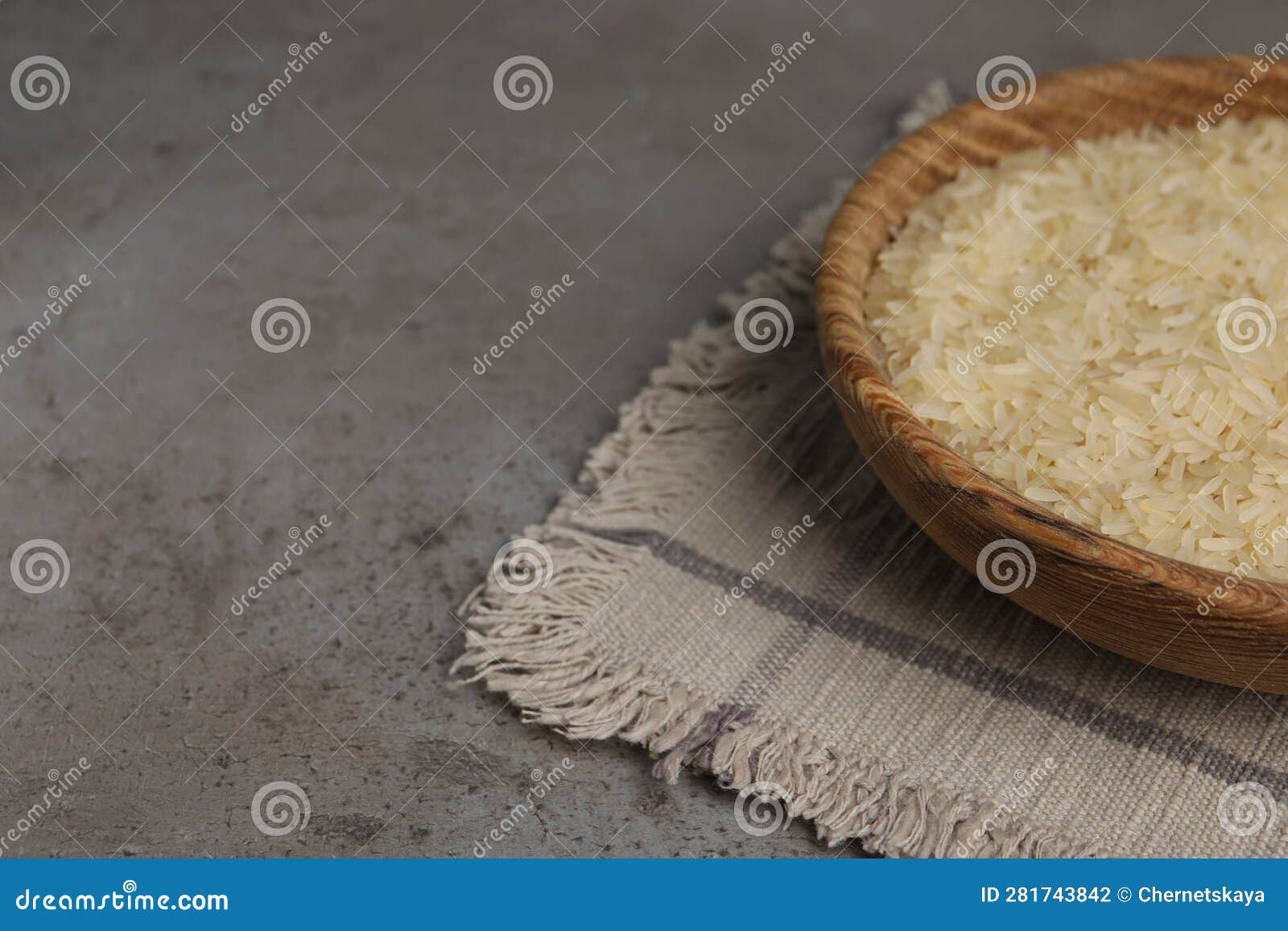 Bowl of Raw Rice on Table. Space for Text Stock Photo - Image of ...