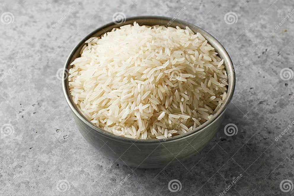 Bowl of raw rice stock photo. Image of health, healthy - 346251732