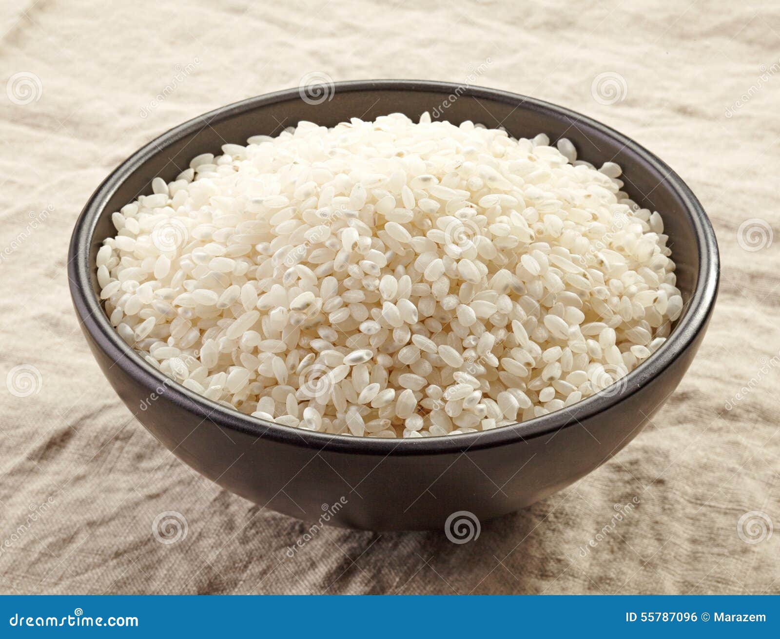 Bowl of raw round rice stock photo. Image of heap, bowl - 55787096