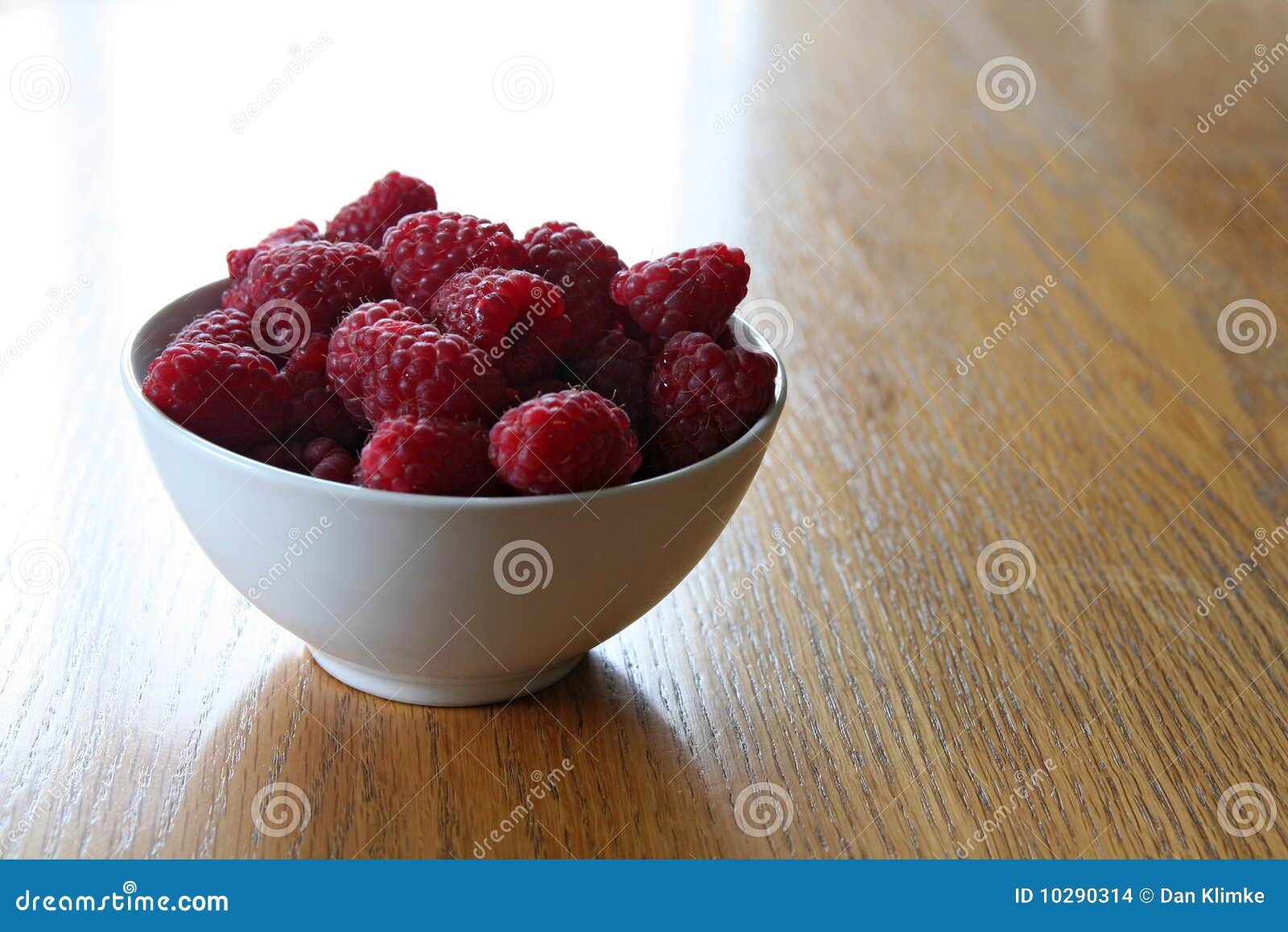 Bowl of Red Raspberries stock photo. Image of juicy, fruit - 10290314