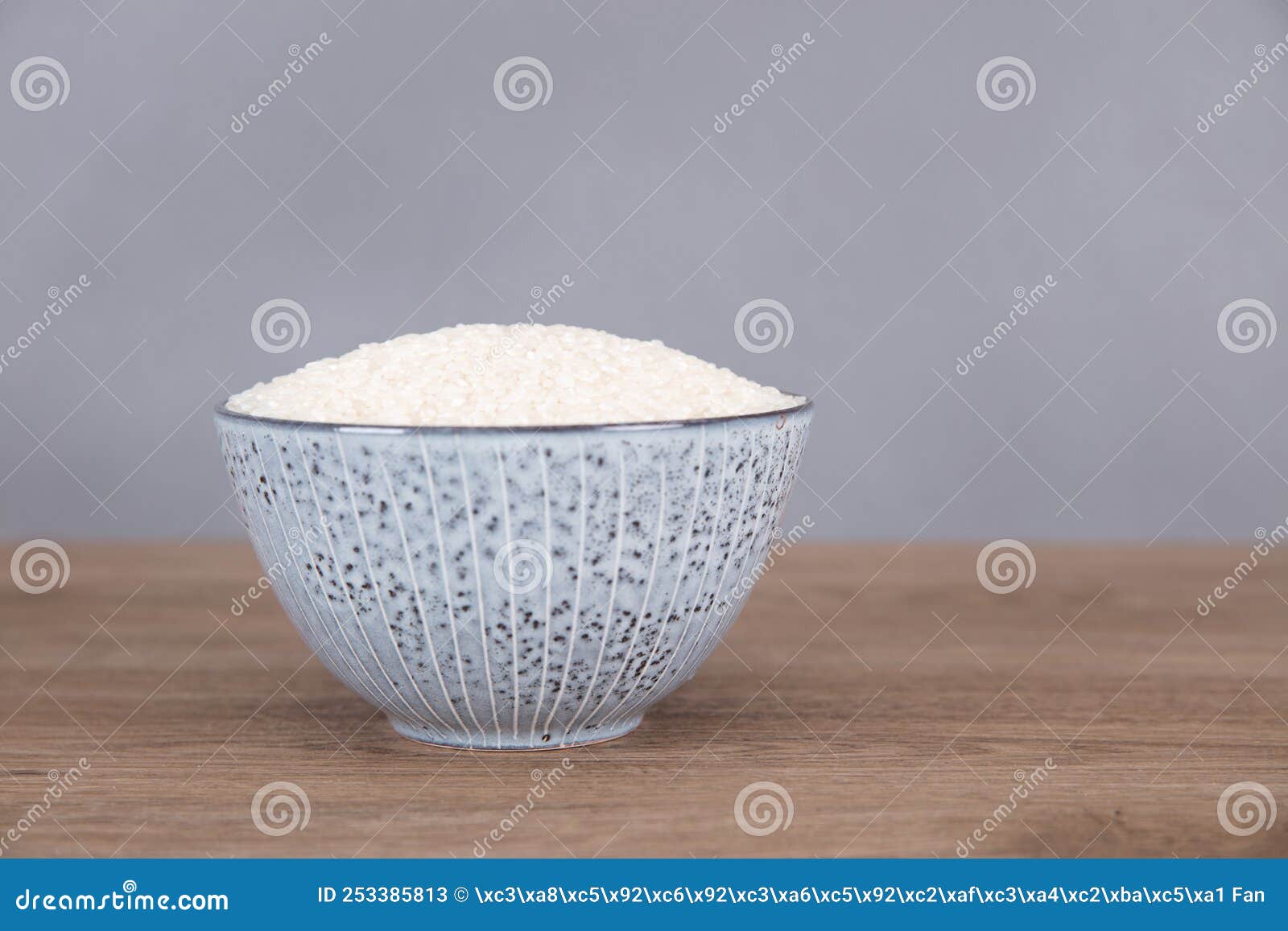 A bowl of rice on table stock image. Image of food, life - 253385813