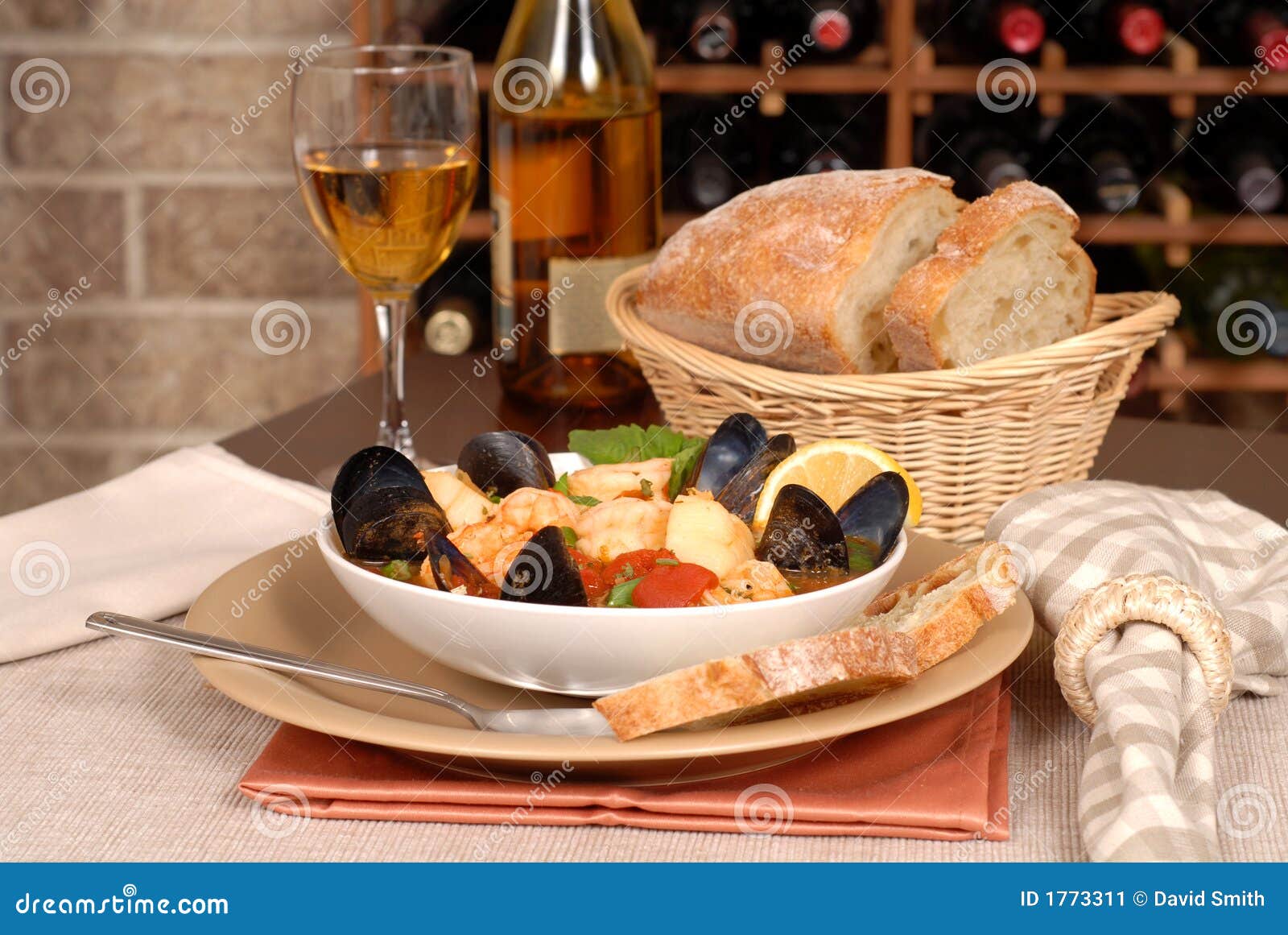Bowl of Seafood Soup with Wine and Rustic Bread Stock Image - Image of ...