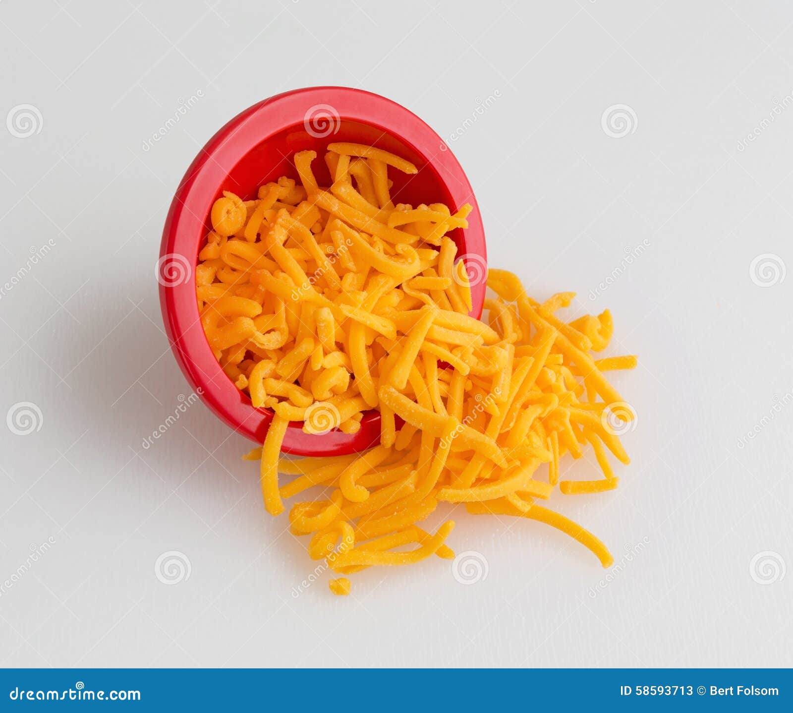 Portion Of Shredded Sharp Cheddar Cheese On White Background Royalty ...