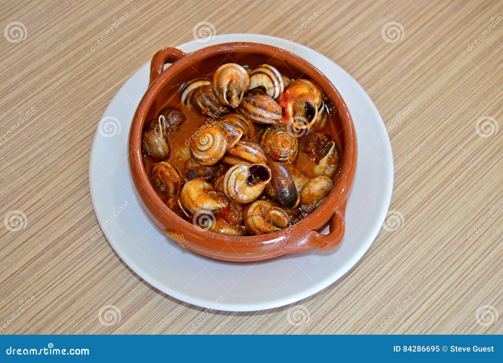 A Bowl of Snails stock image. Image of cooking, sauce - 84286695
