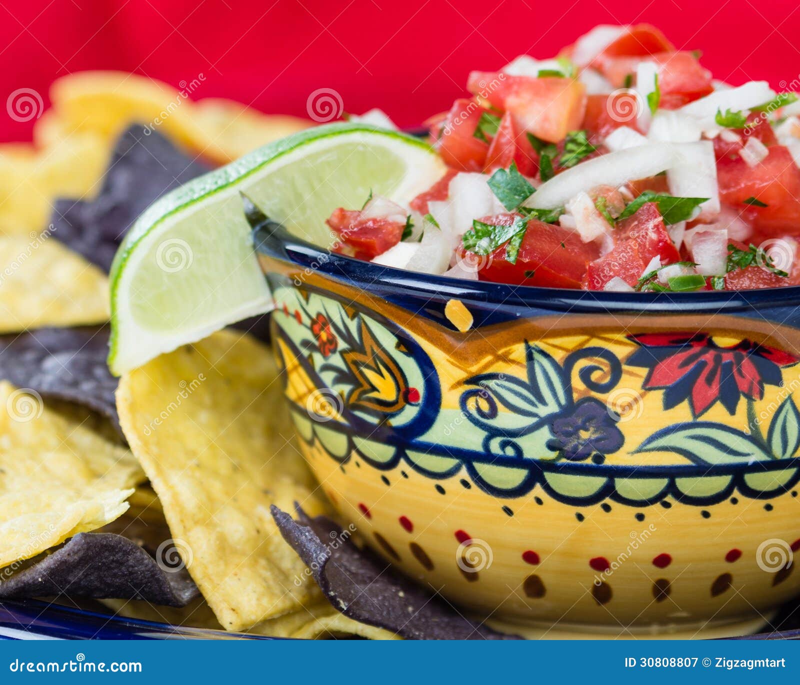 Bowl of Spicy Salsa and Corn Chips Stock Image - Image of snack, blue ...