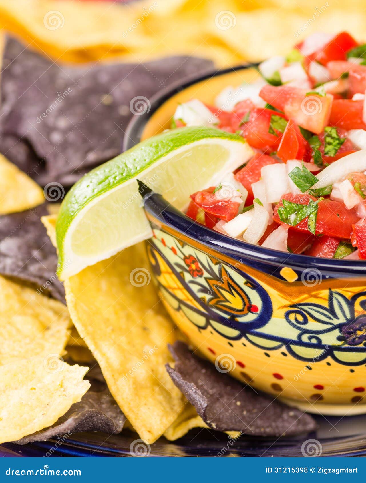 Bowl of Spicy Salsa and Corn Chips Stock Photo - Image of blue, sauces ...