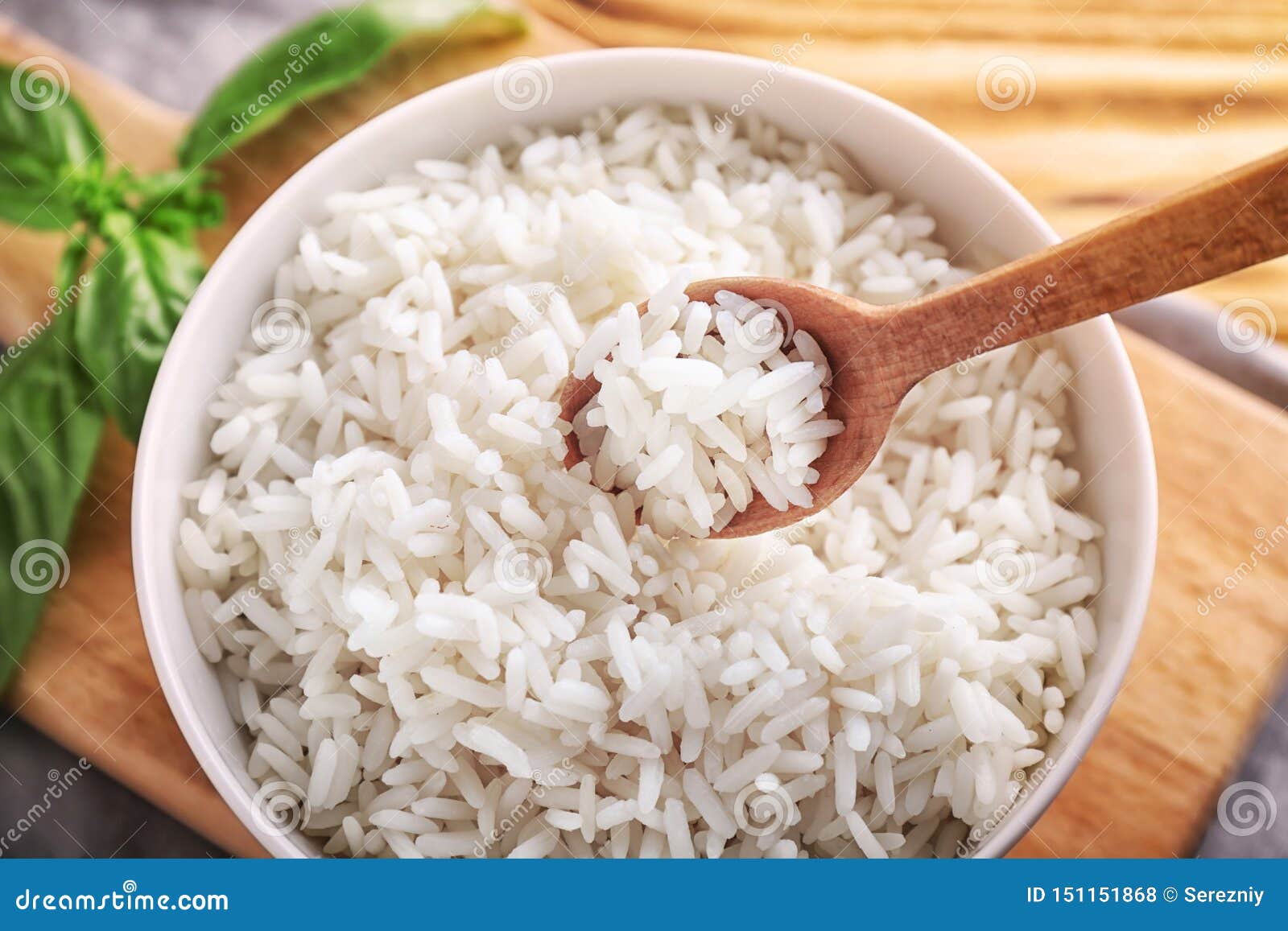 Bowl and Spoon with Boiled White Rice on Table Stock Photo - Image of ...