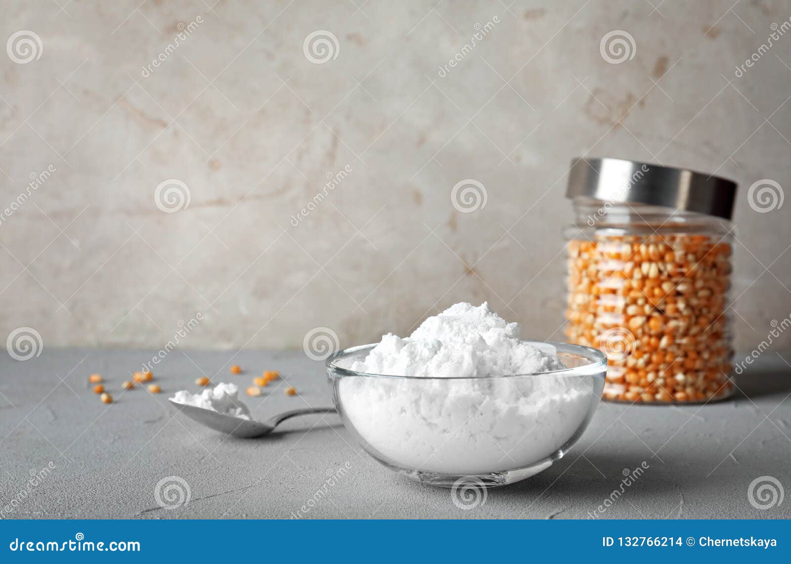 Bowl and Spoon with Corn Starch on Grey Table Stock Photo - Image of ...