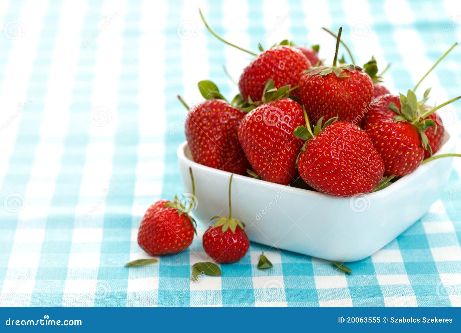 Bowl of strawberries stock image. Image of tablecloth - 20063555