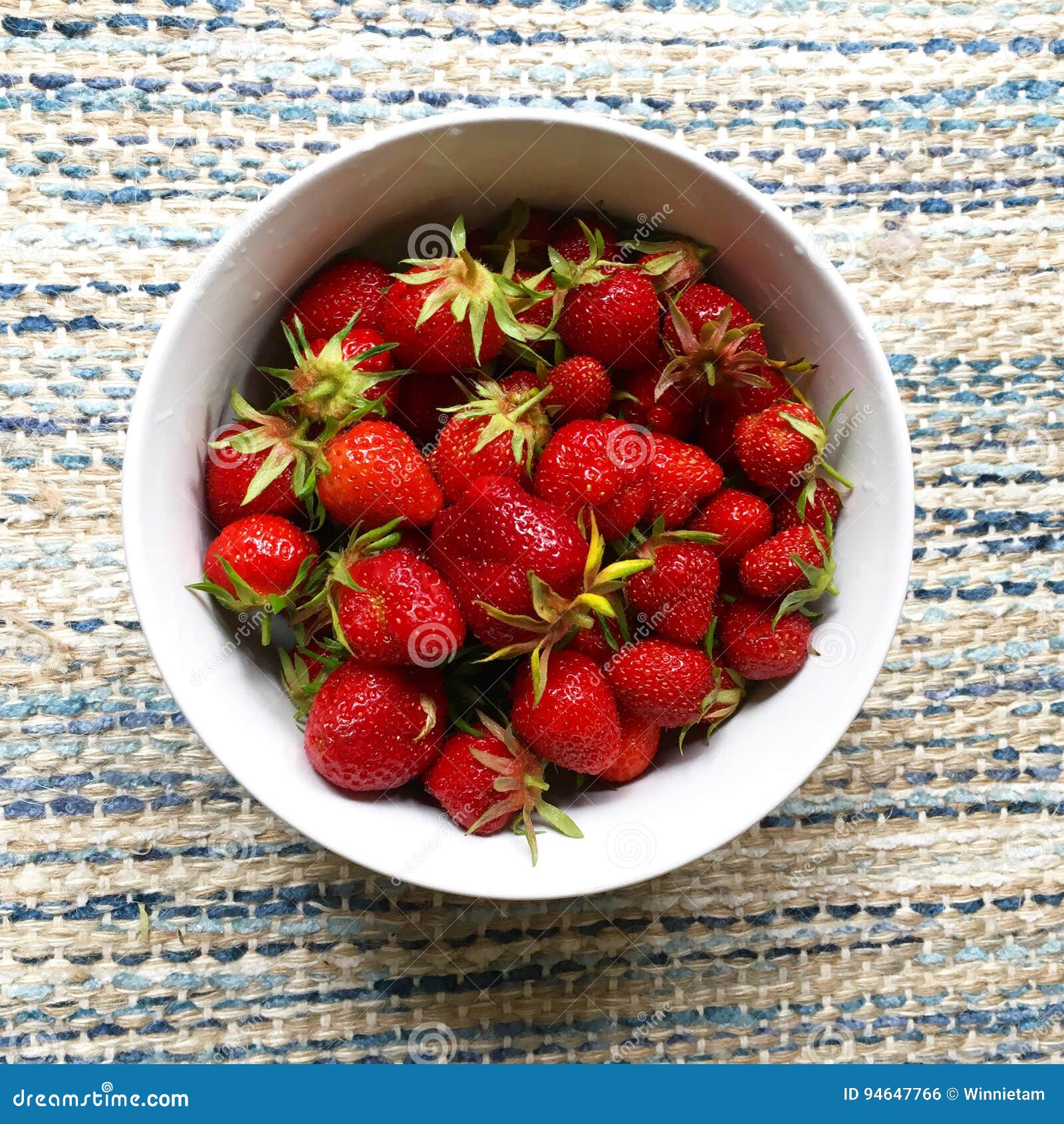 Bowl of strawberries stock photo. Image of food, green - 94647766