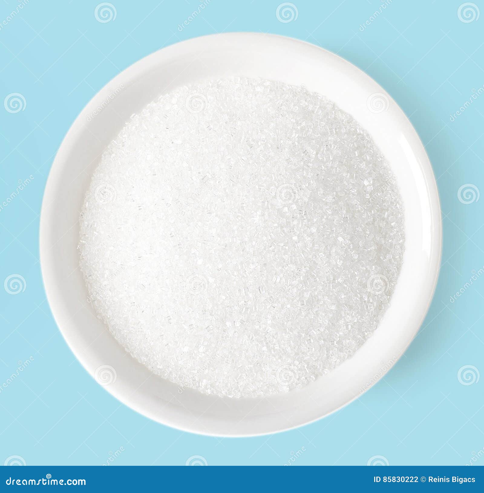 Bowl of Sugar on Blue Background, Top View Stock Photo - Image of ...