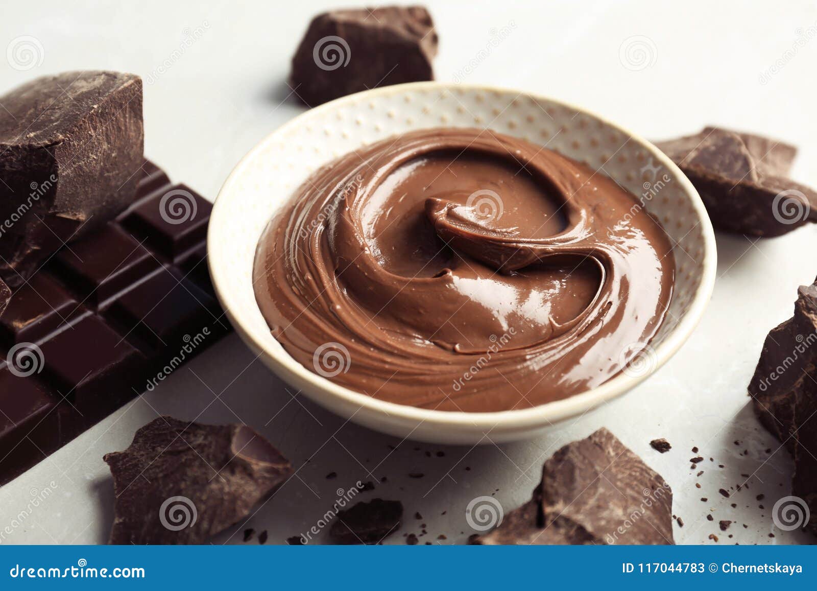 Bowl with Tasty Melted Chocolate and Pieces Stock Image - Image of ...