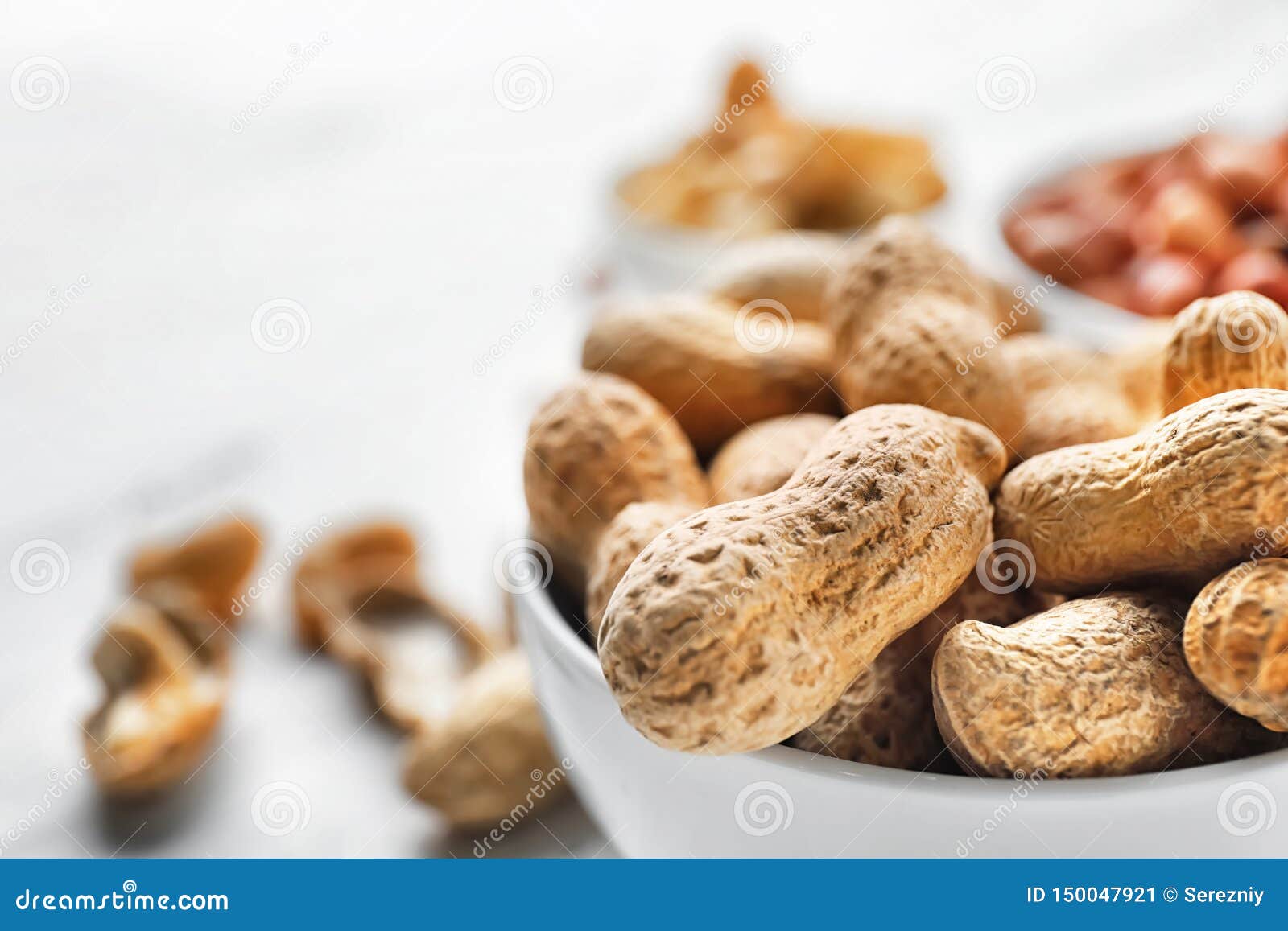 Bowl with Tasty Peanuts on Table, Closeup Stock Image - Image of tasty ...