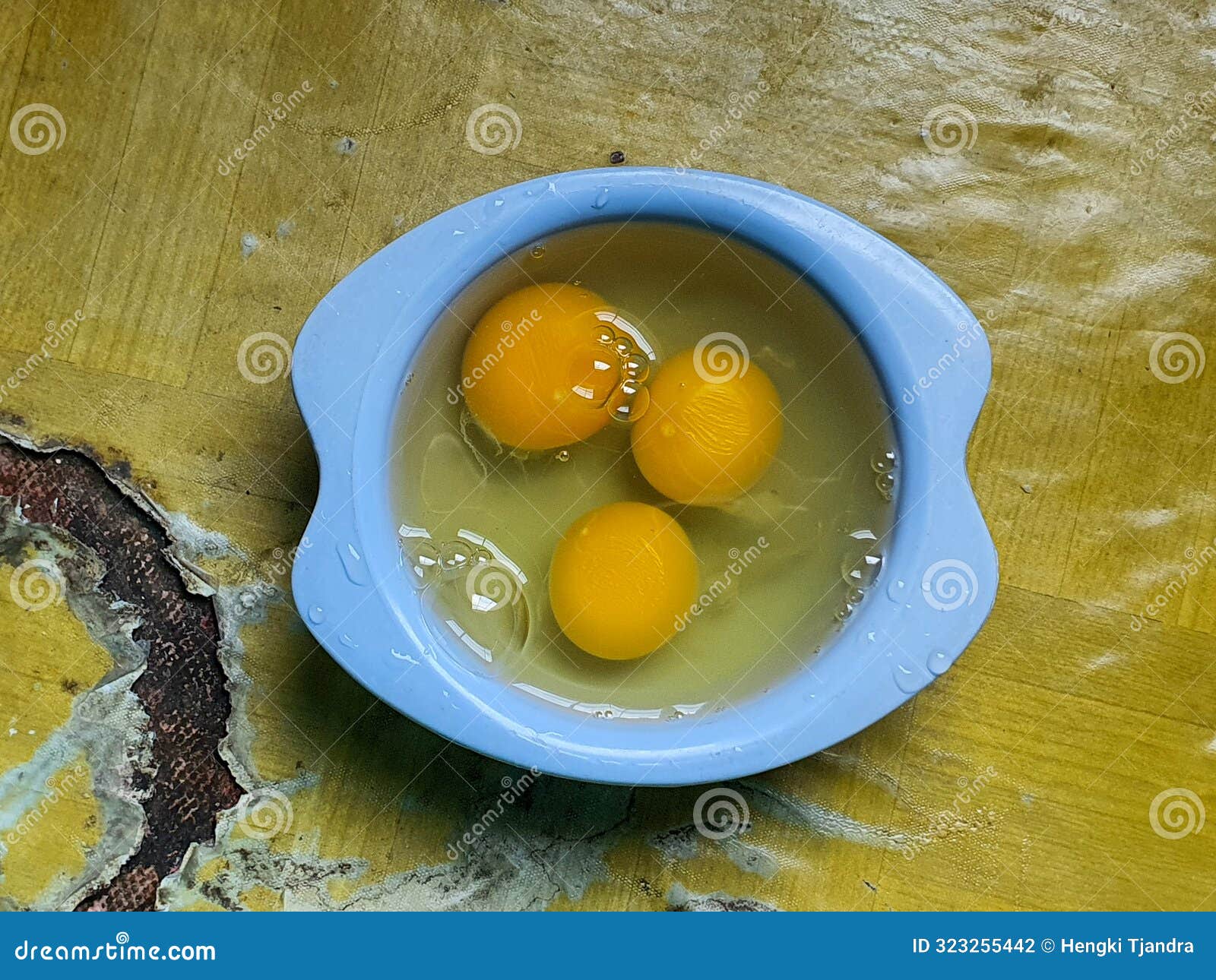 Bowl of Three Egg Yolks. Top View. Flat Lay Shoot Stock Photo - Image ...