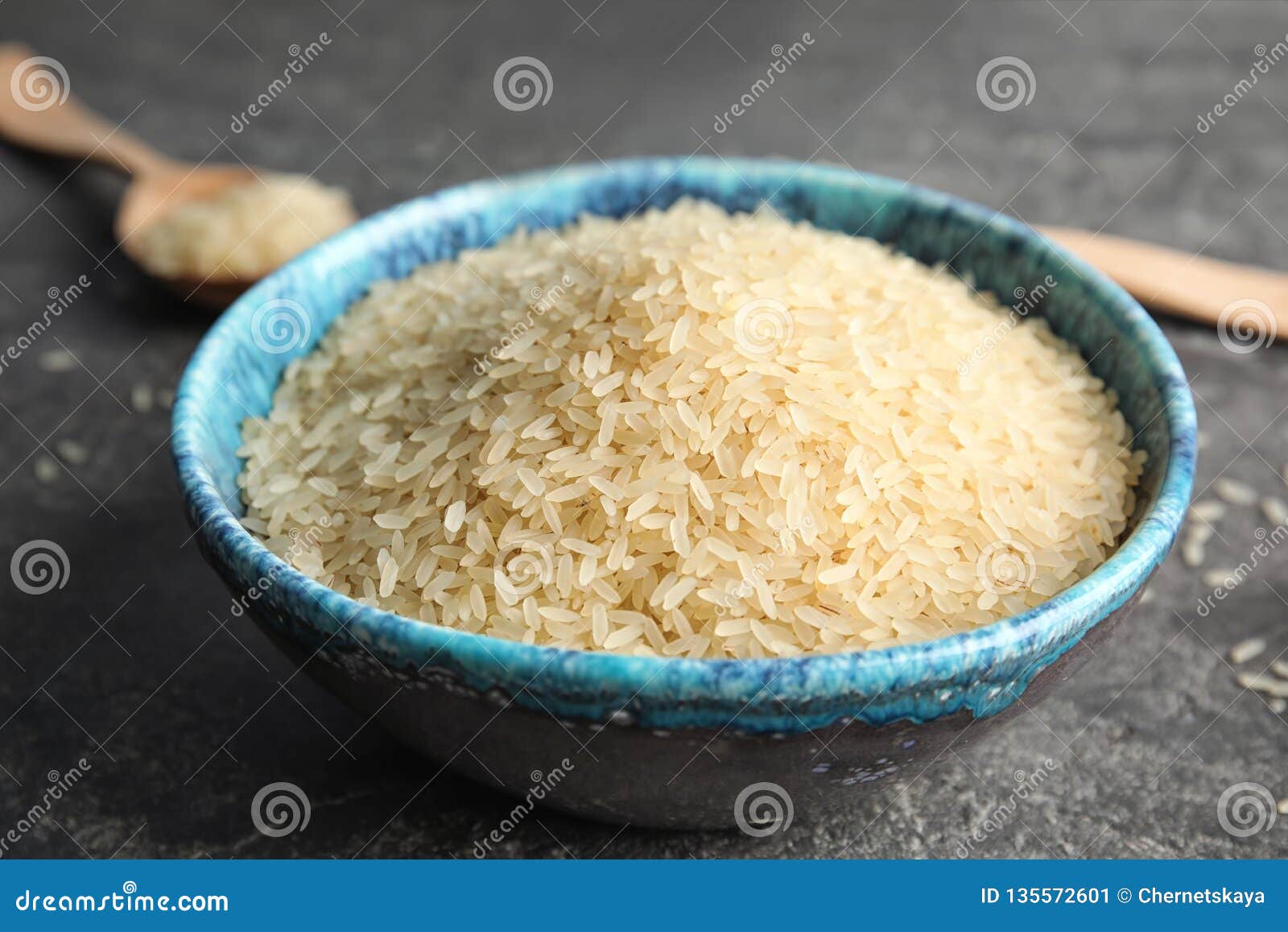 Bowl with Uncooked Rice on Table Stock Image - Image of tasty, meal ...