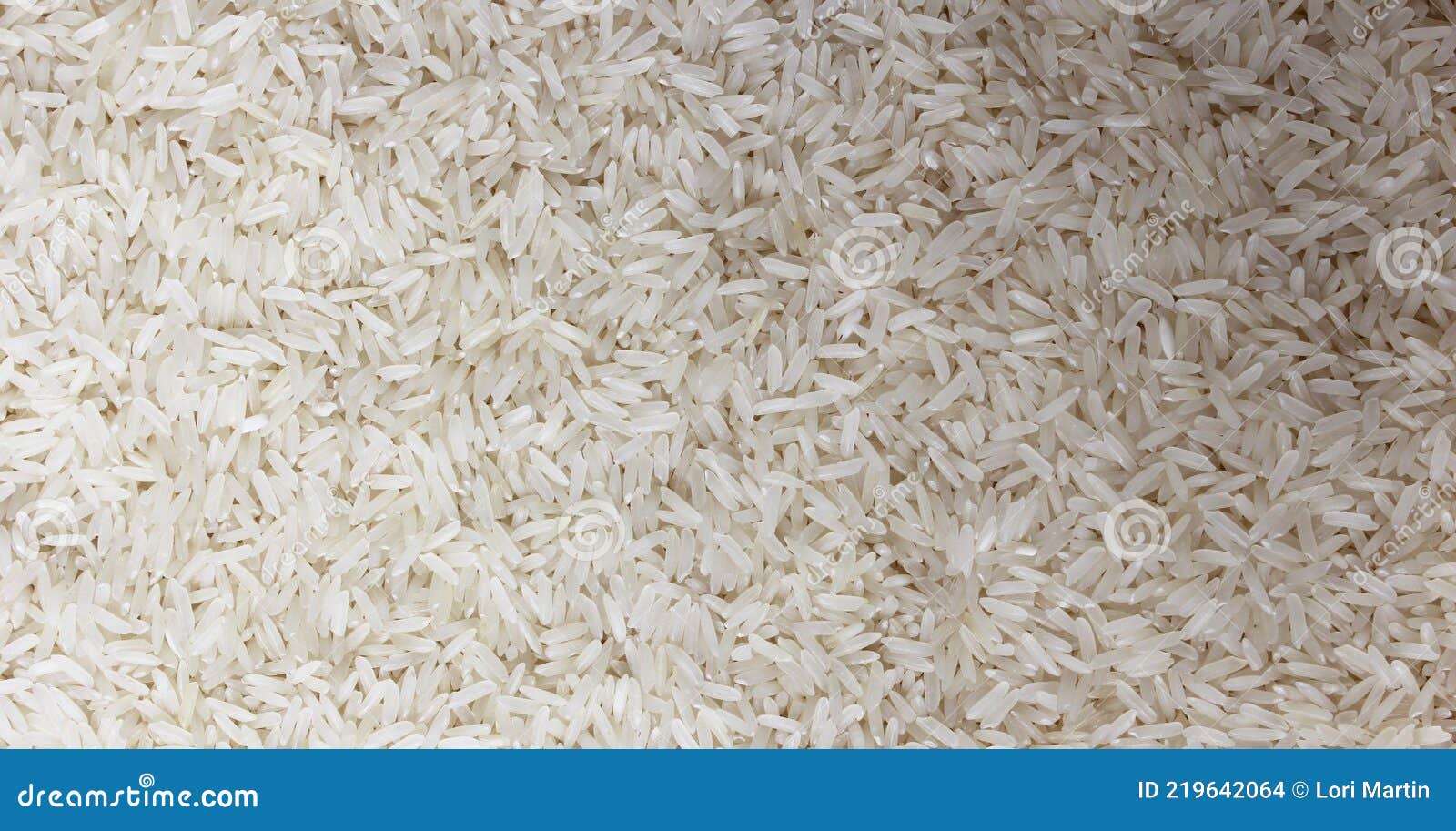 Bowl of Uncooked White Rice with Leaf and Bamboo Mat Stock Photo ...