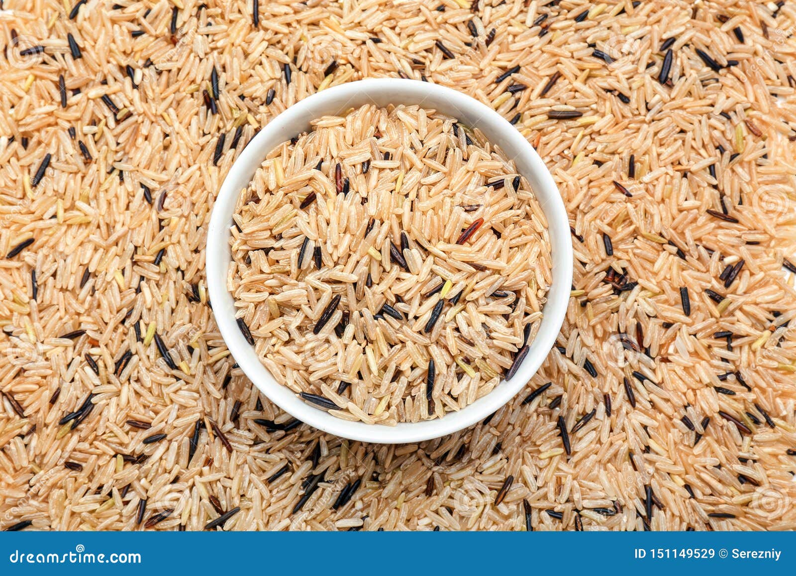 Bowl on unpolished rice stock image. Image of cook, taste - 151149529